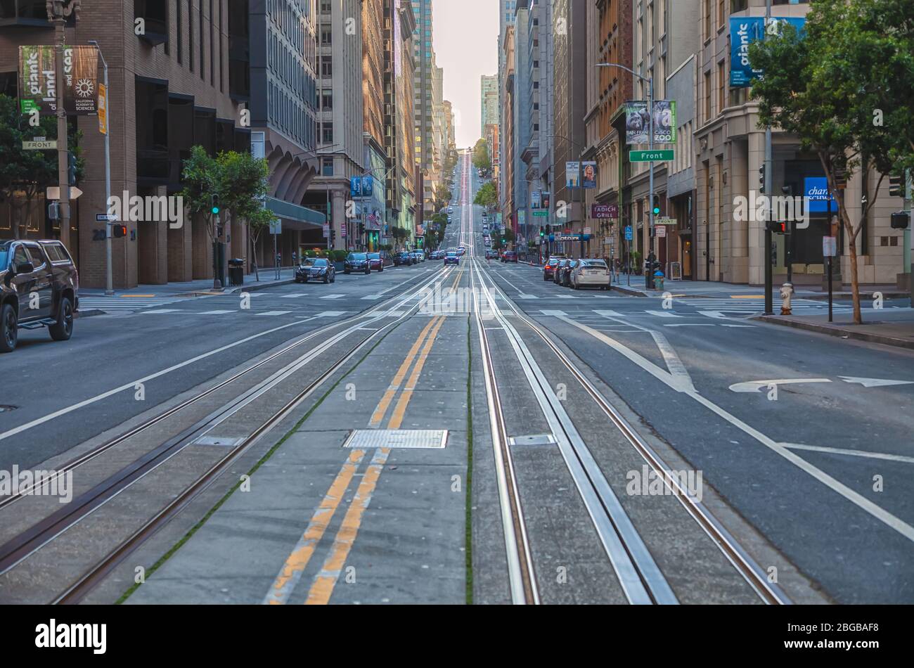 California Street by Downtown is empty of pedestrians and traffic ...