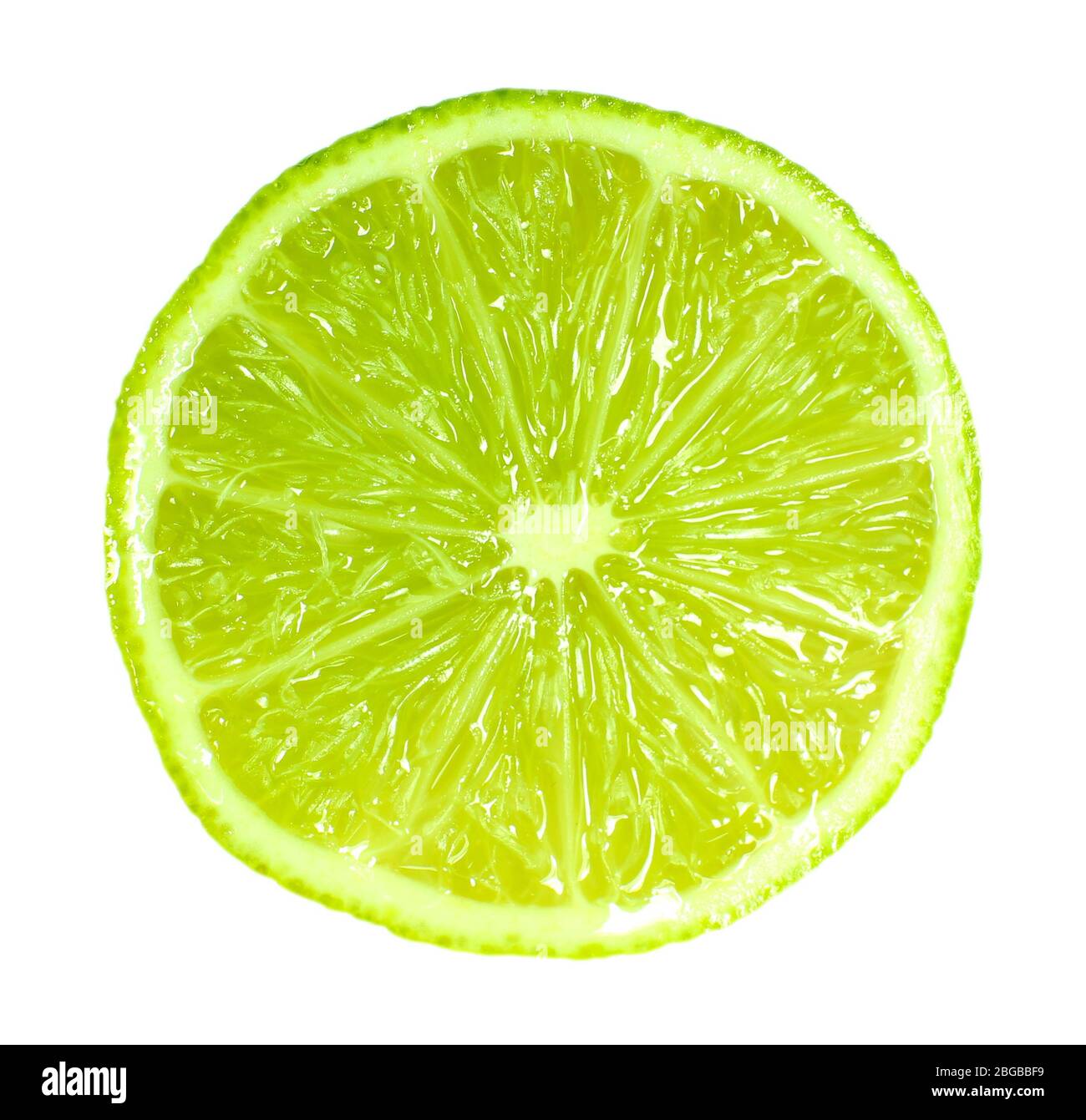 Slice of fresh lime, isolated on white Stock Photo - Alamy