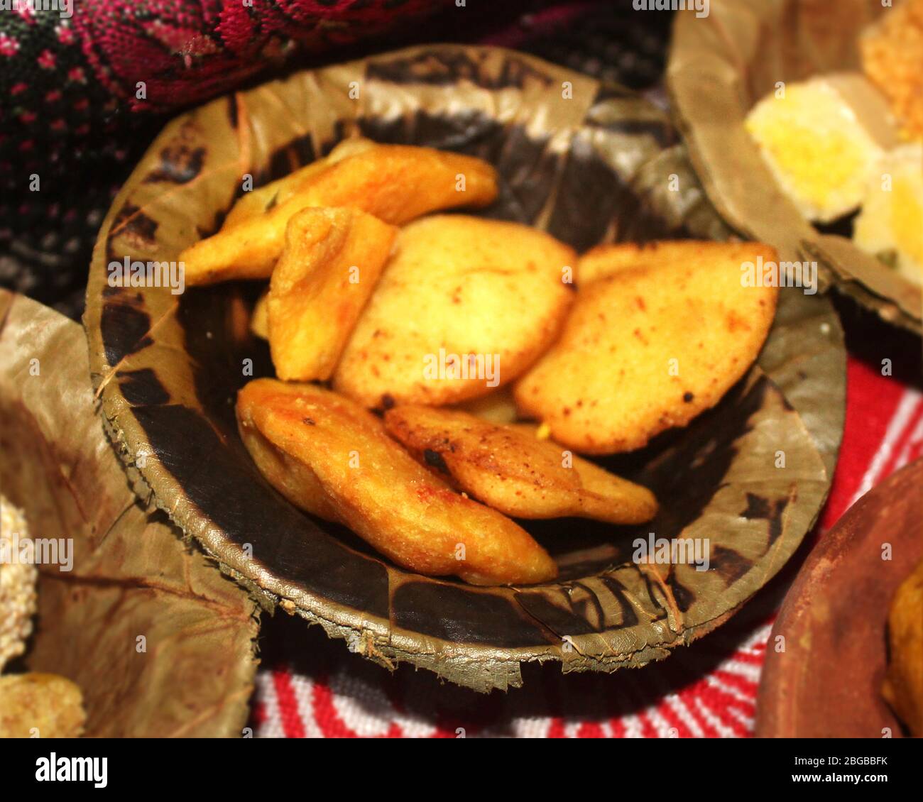 Crispy Pakoda Indian Food served in disposable plate made from dry leaf ...