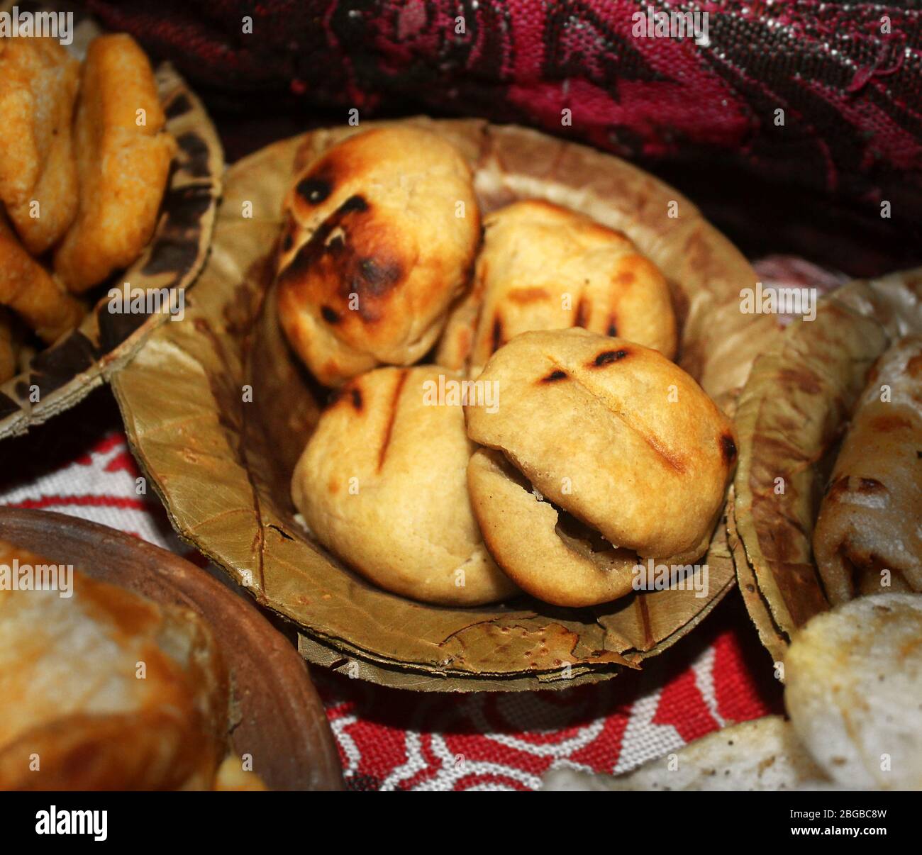 Bati, litti chokha,flaky biscuit served in disposable plate made from ...