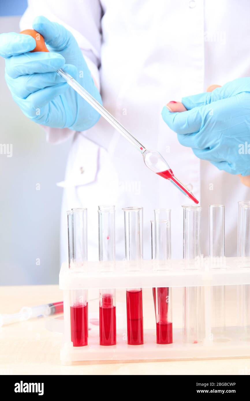 Nurse taking a blood sample, close up Stock Photo - Alamy