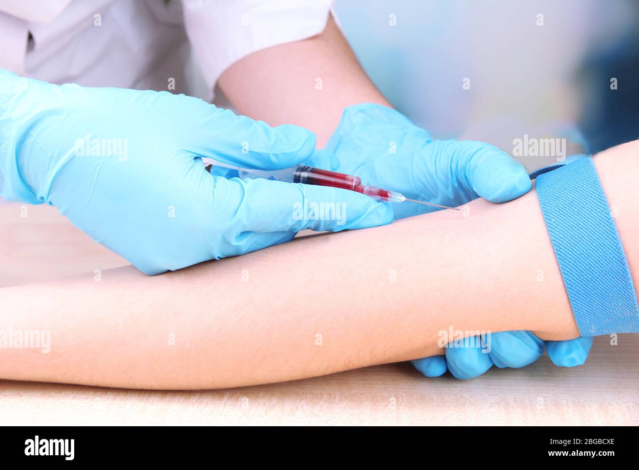 Nurse taking a blood sample, close up Stock Photo - Alamy
