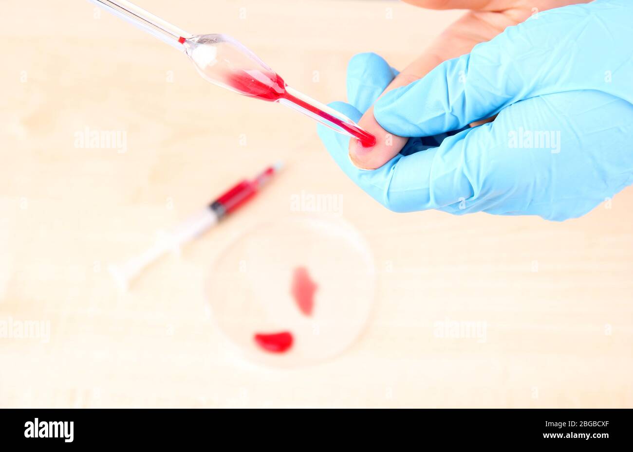 Nurse taking a blood sample, close up Stock Photo - Alamy