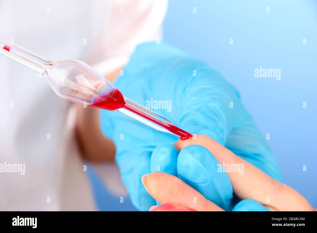 Nurse taking a blood sample, close up Stock Photo - Alamy