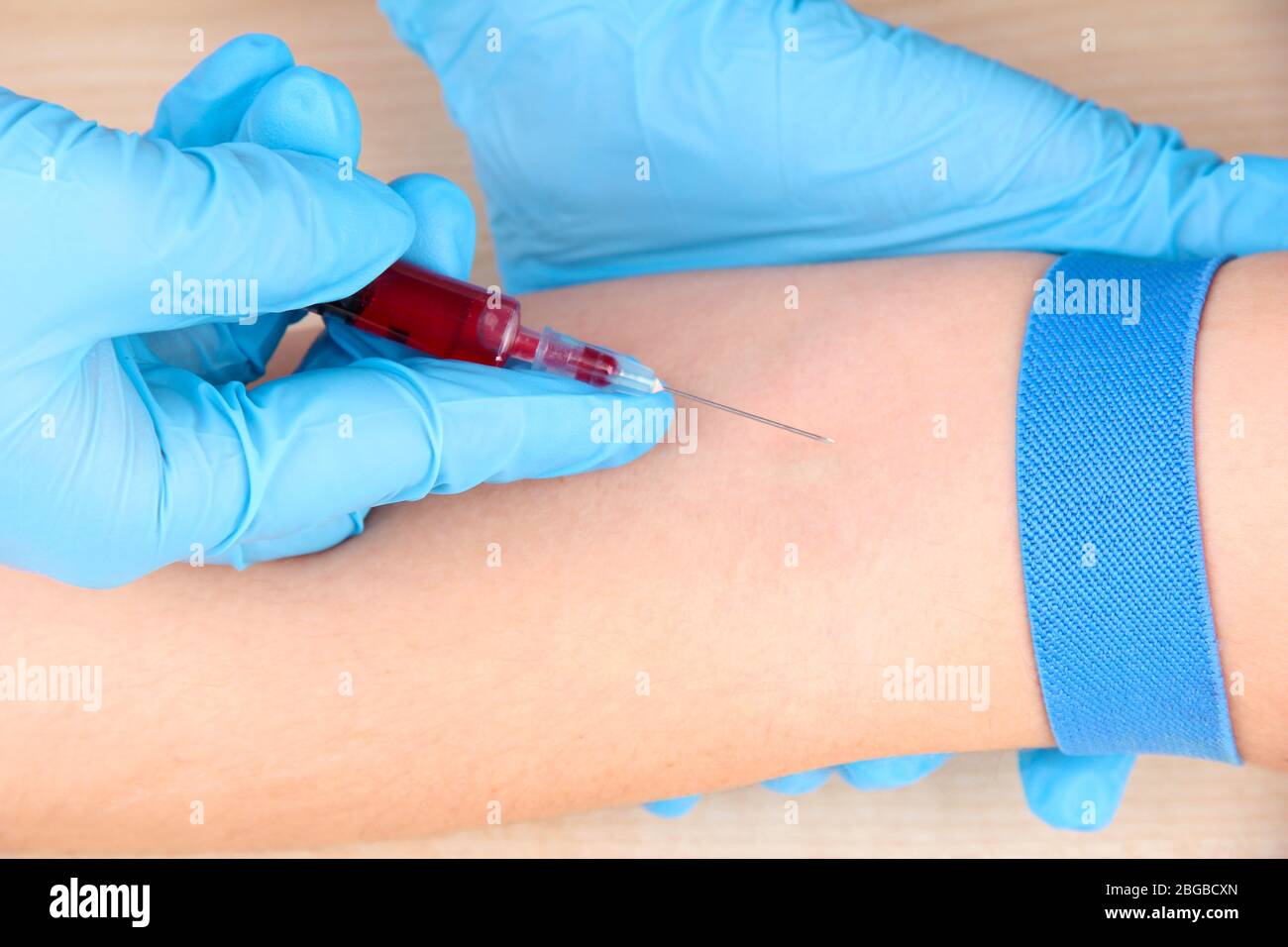 Nurse taking a blood sample, close up Stock Photo - Alamy