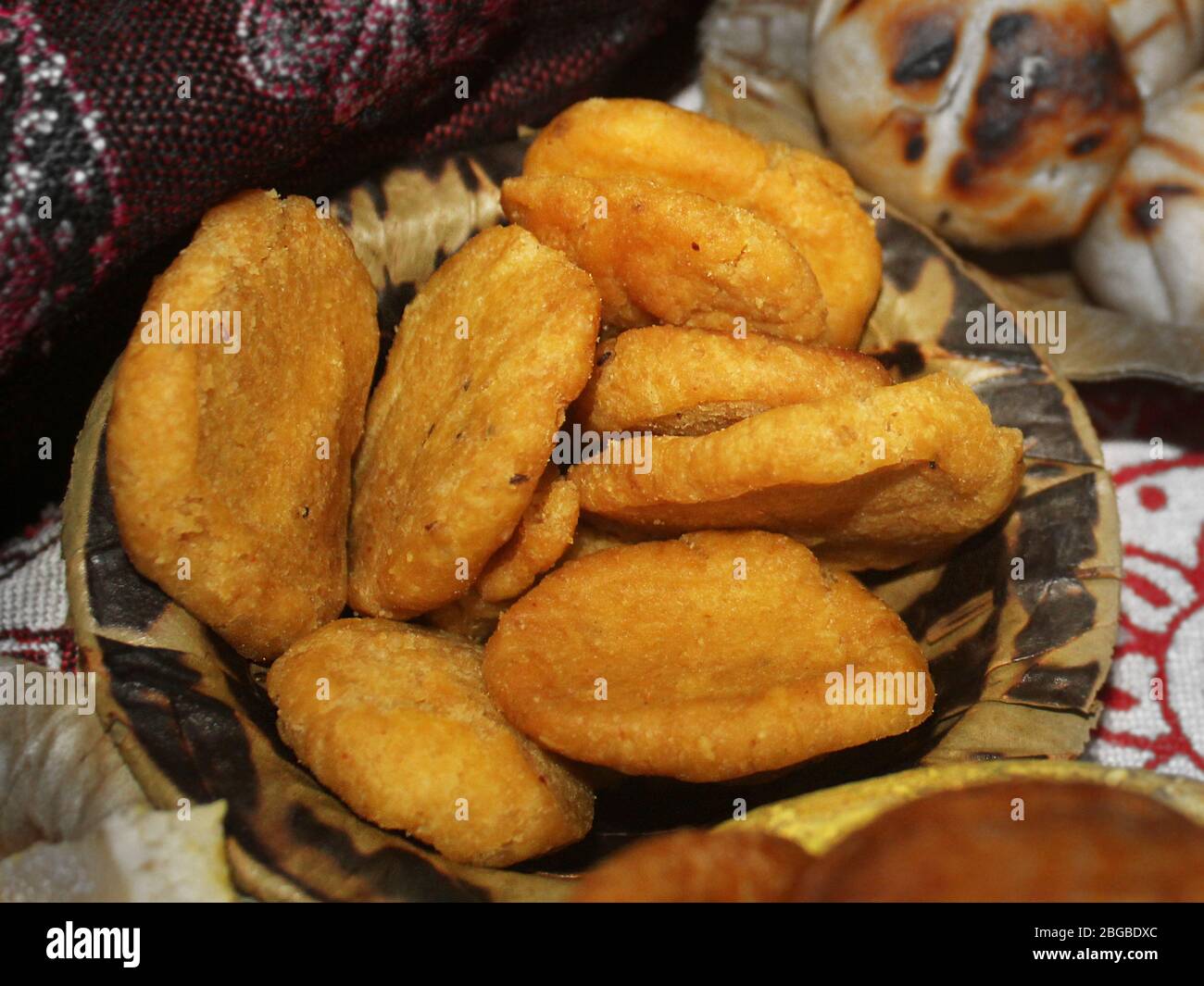 Crispy Pakoda Indian Food served in disposable plate made from dry leaf ...