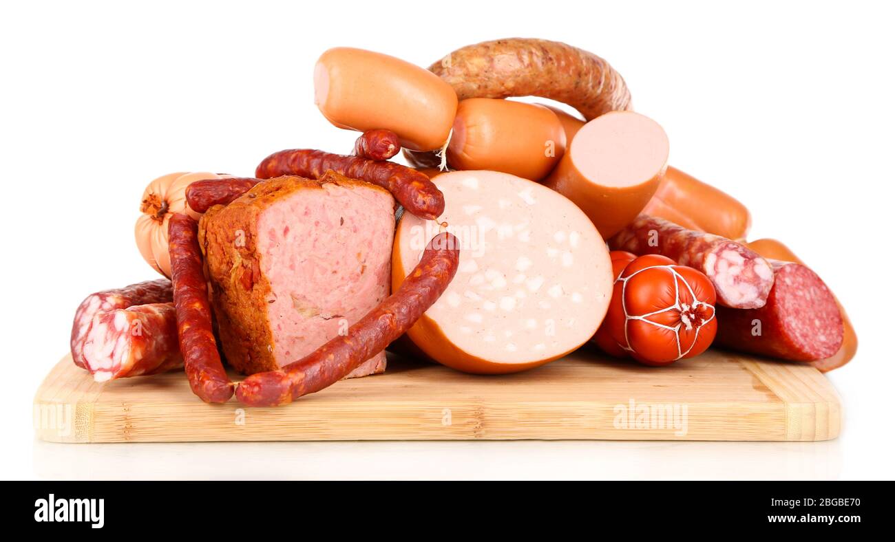 Lot of different sausages on wooden board isolated on white Stock Photo ...