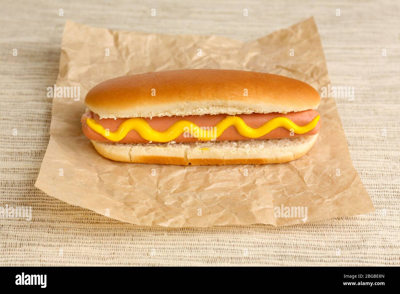 Tasty hot dog on paper Stock Photo - Alamy