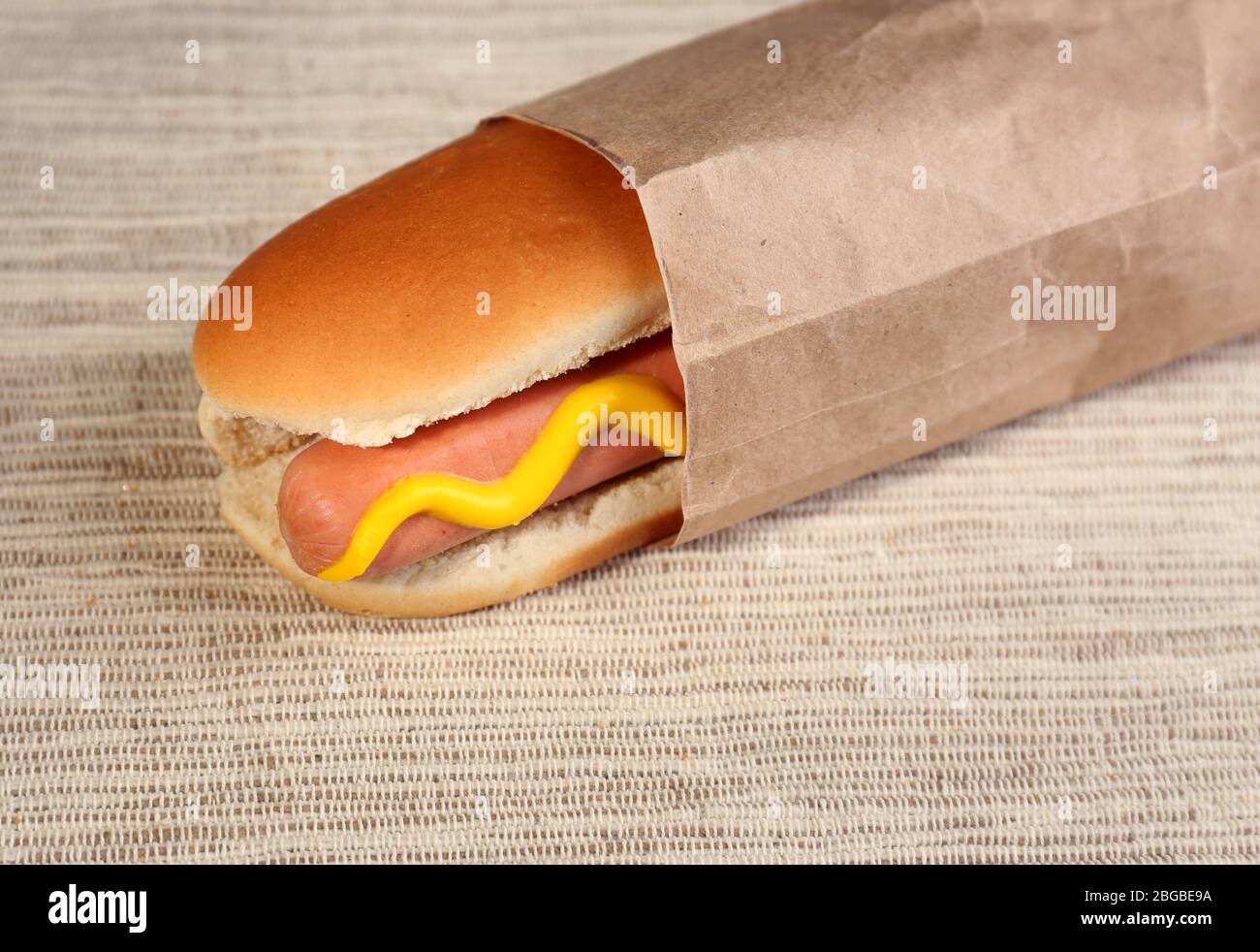 Tasty hot dog on paper Stock Photo - Alamy