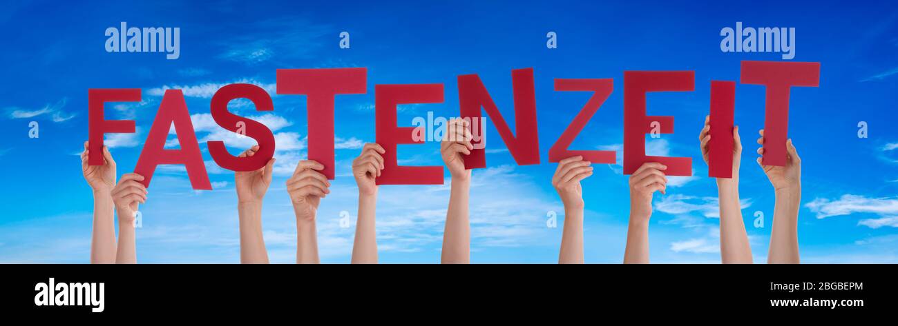 People Hands Holding Word Fastenzeit Means Fasting, Blue Sky Stock ...