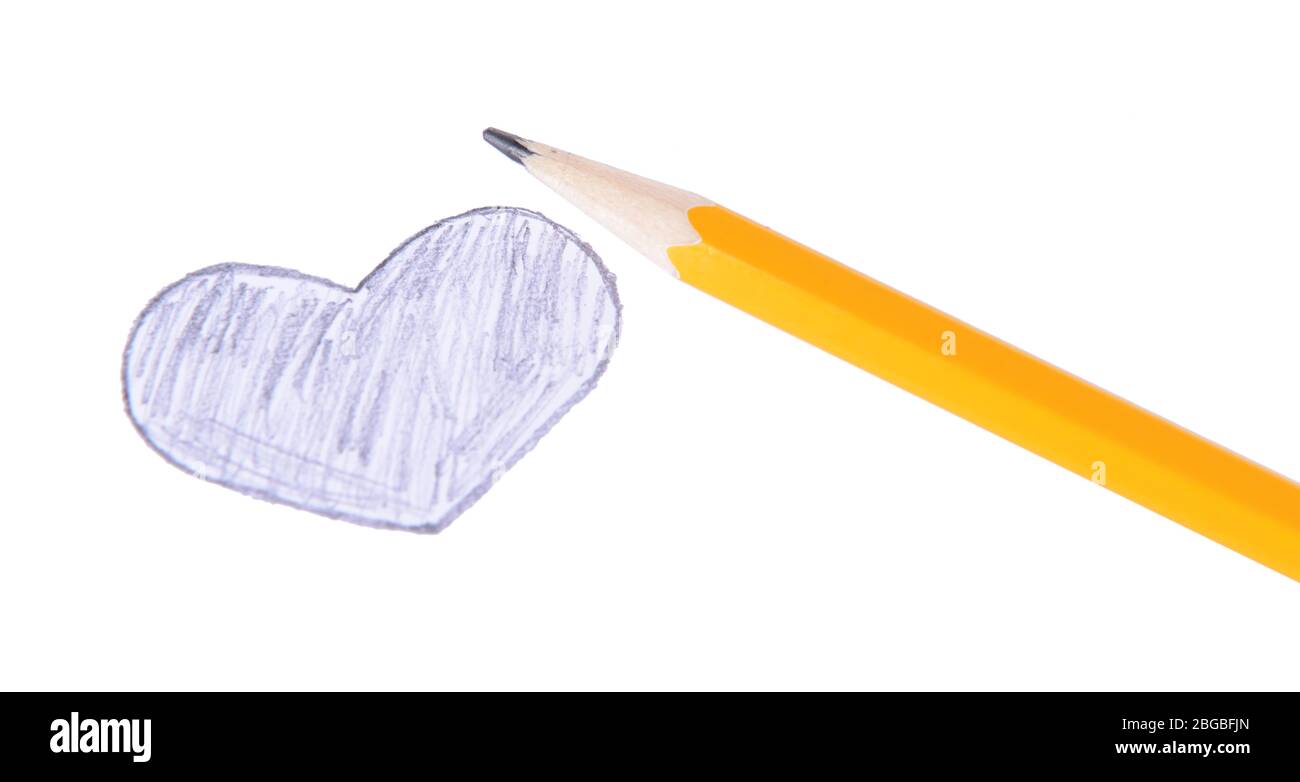 Heart drawn in pencil on a paper sheet close-up Stock Photo - Alamy