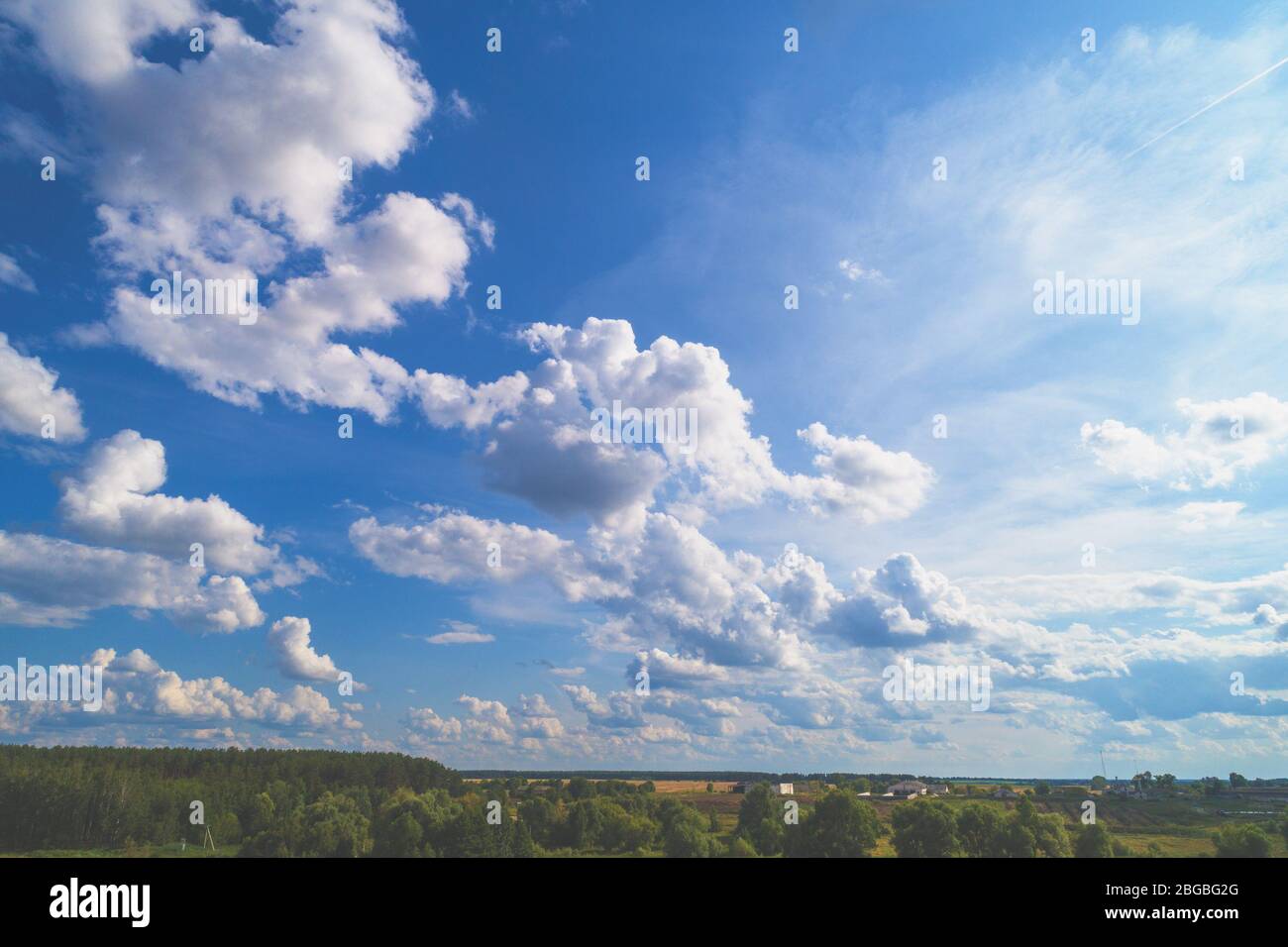 Blue sky with clouds over the countryside. Abstract nature sky ...