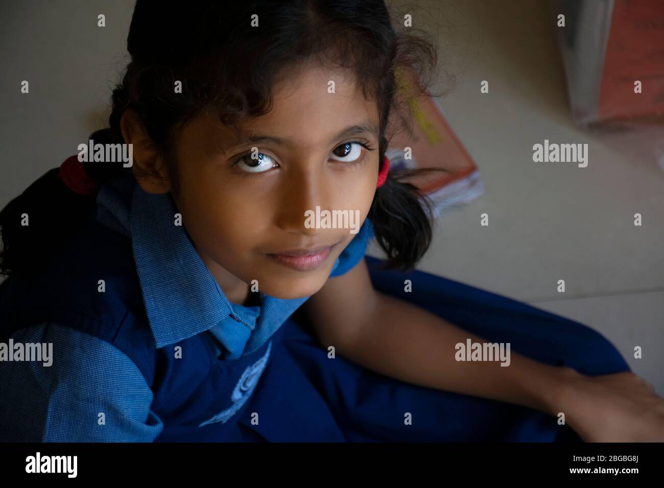 Indian girl writing hi-res stock photography and images - Alamy