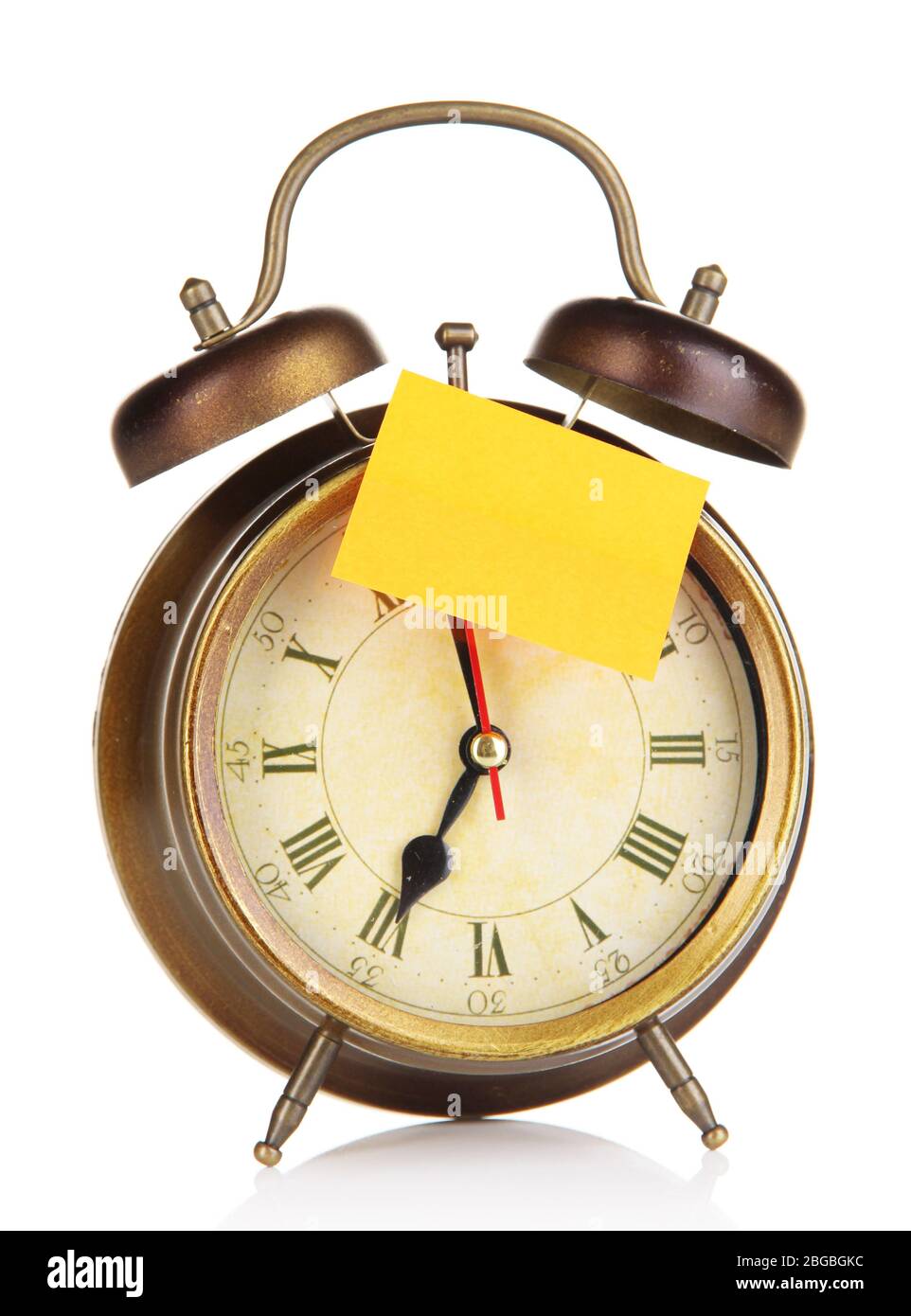 Alarm clock with sticker isolated on white Stock Photo - Alamy