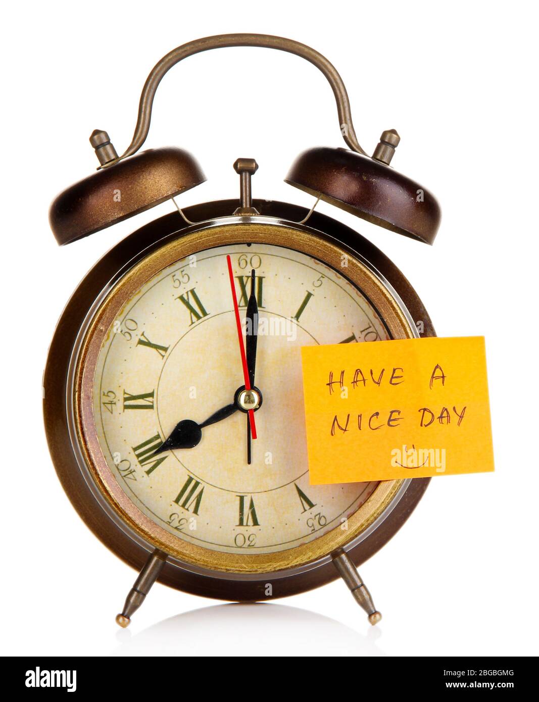 Alarm clock with sticker isolated on white Stock Photo - Alamy