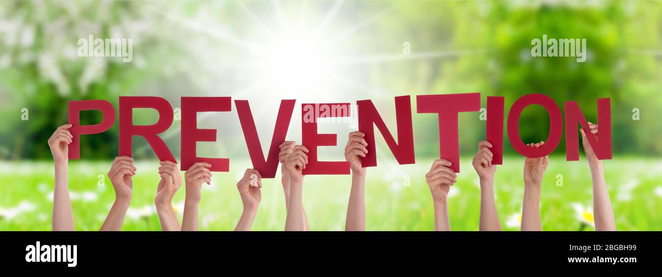 People Hands Holding Word Prevention, Grass Meadow Stock Photo - Alamy
