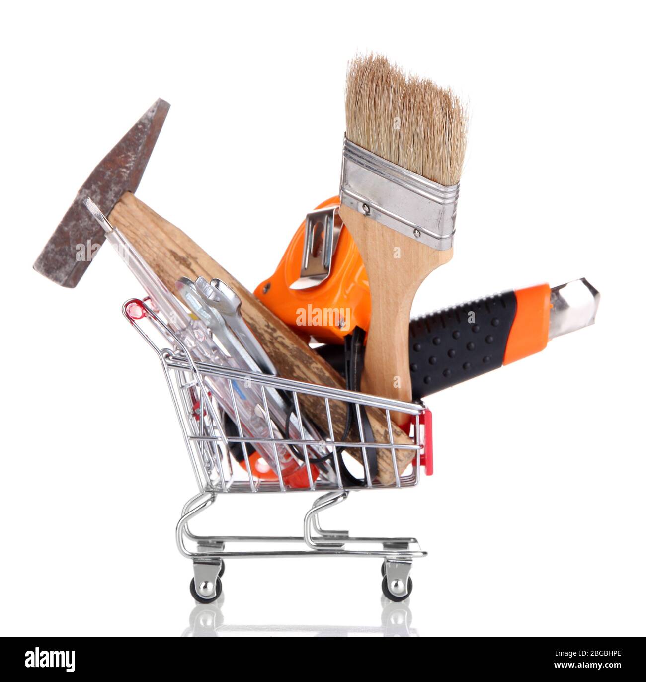 Construction tools in shopping cart isolated on white Stock Photo - Alamy