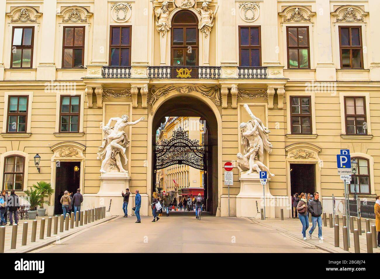 Vienna, Austria - April, 2, 2015: Arch and building view and tourists ...