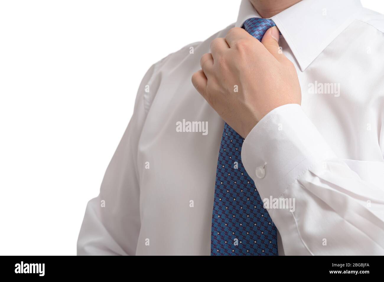 a businessman wearing a tie and getting ready for work in the morning ...
