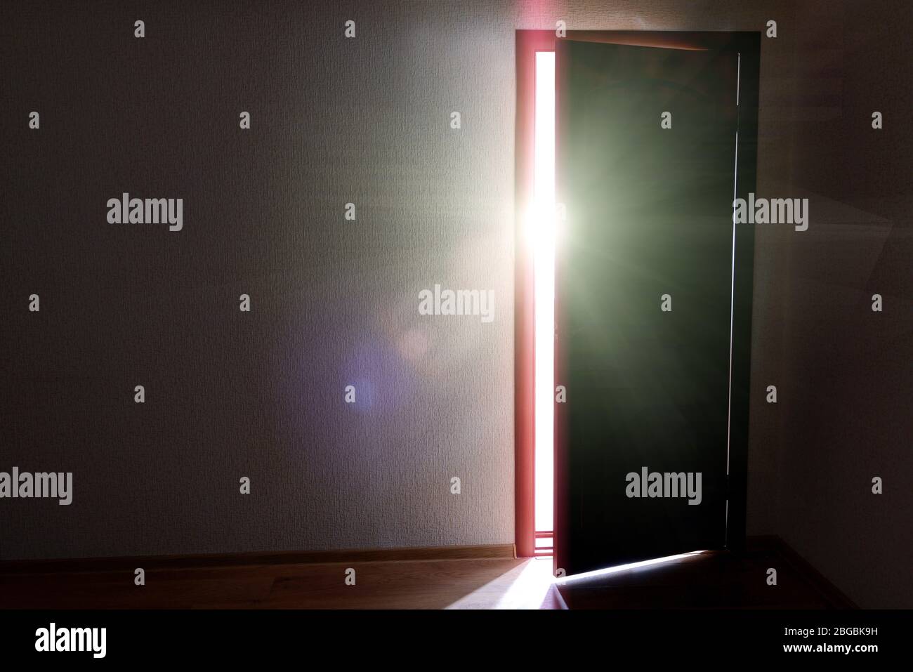 Open door with bright light outside Stock Photo - Alamy
