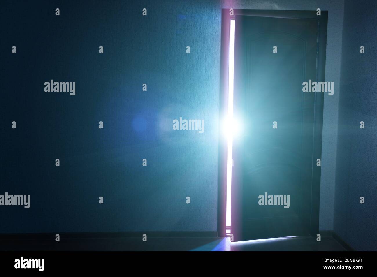 Open door with bright light outside Stock Photo - Alamy