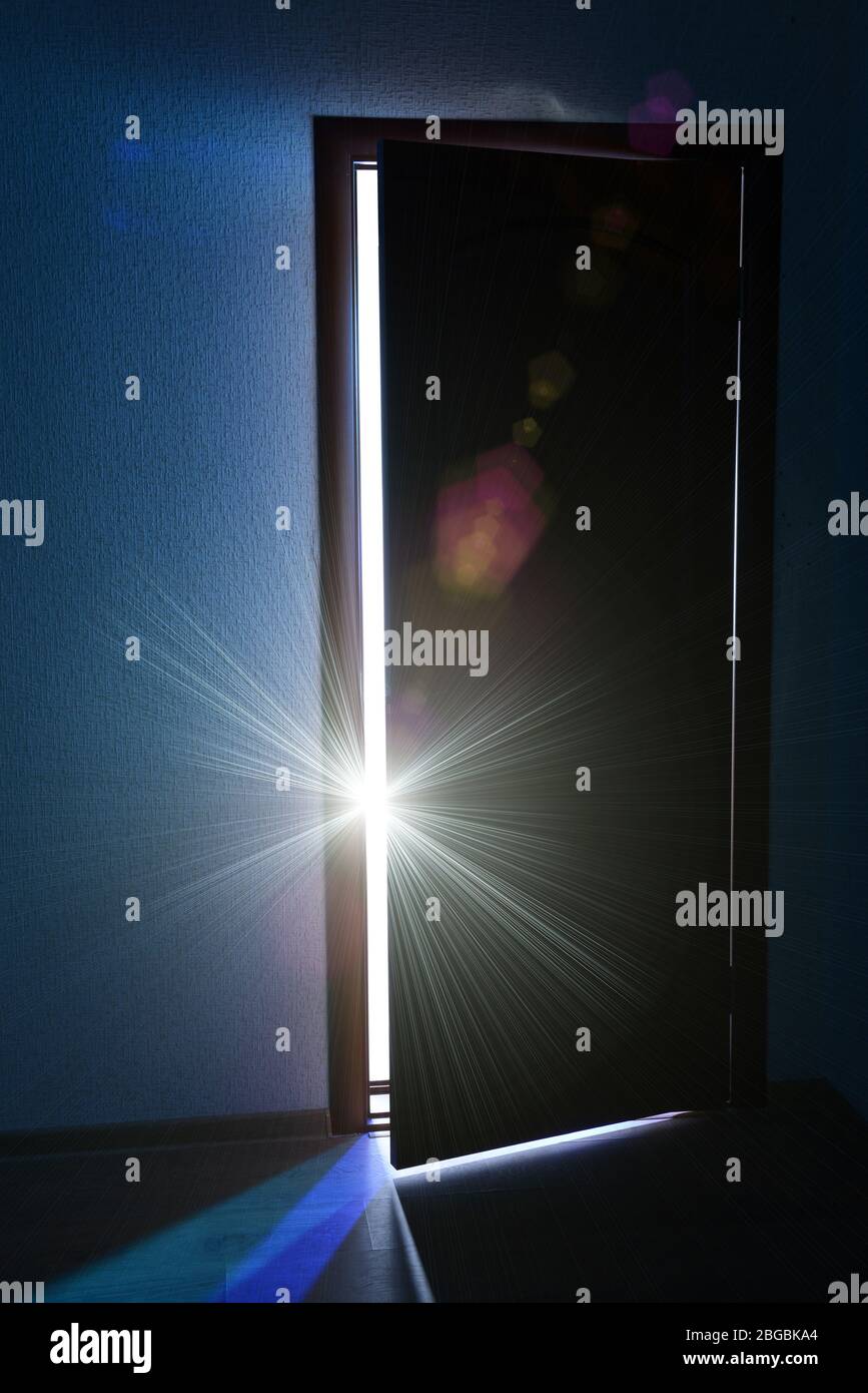 Open door with bright light outside Stock Photo - Alamy