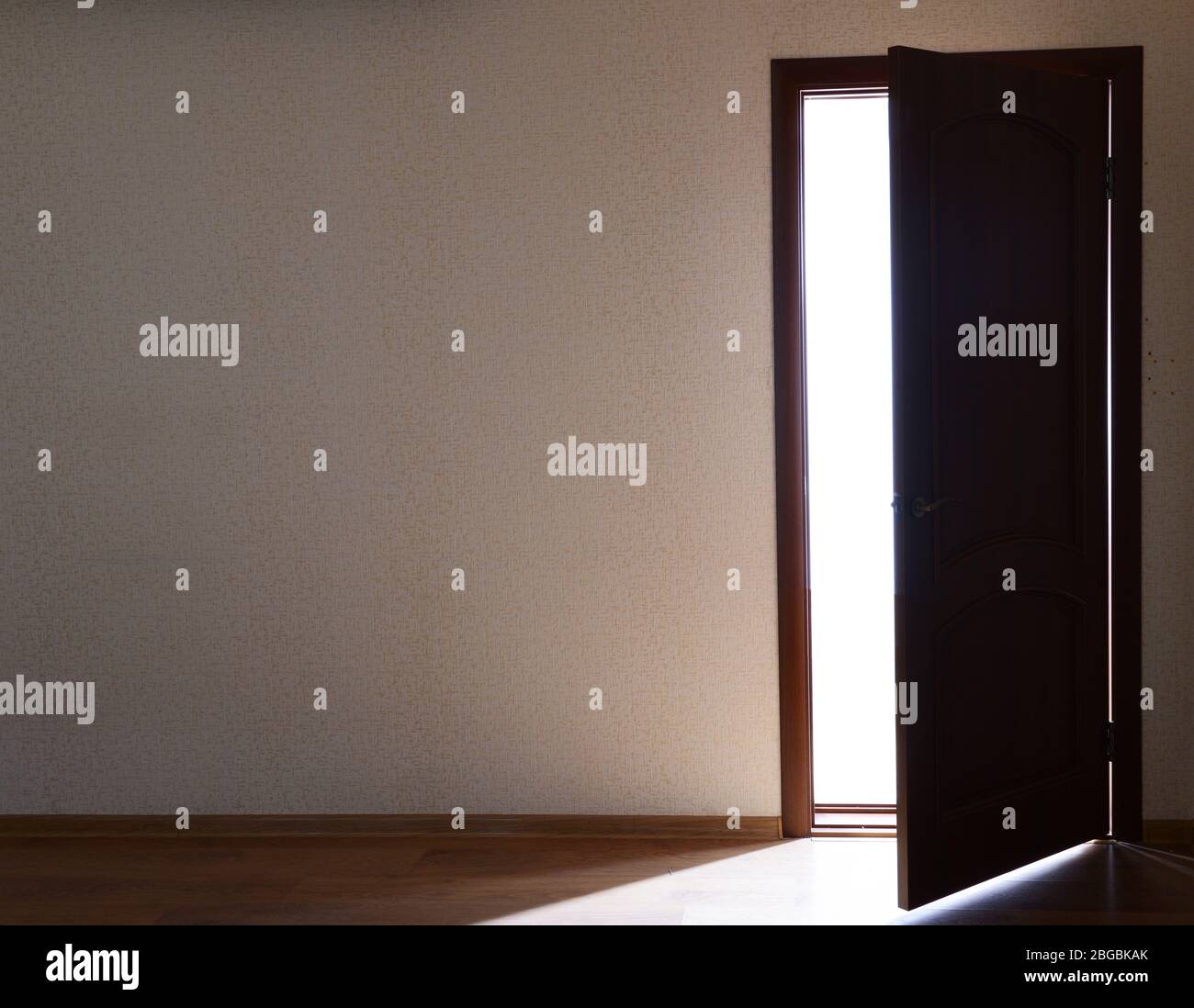 Open door with bright light outside Stock Photo - Alamy
