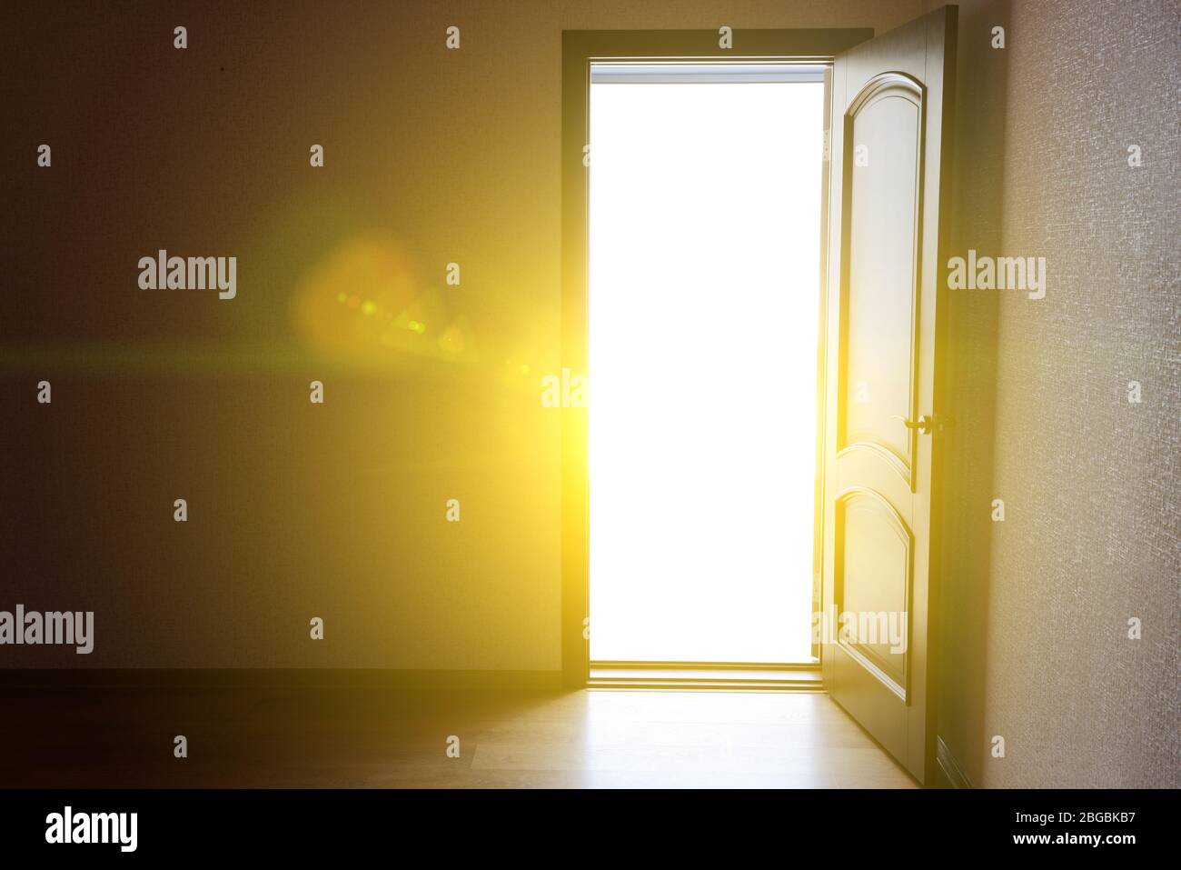 Open door with bright light outside Stock Photo - Alamy
