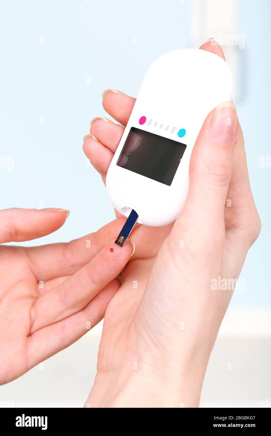 Measuring glucose level blood close-up Stock Photo - Alamy