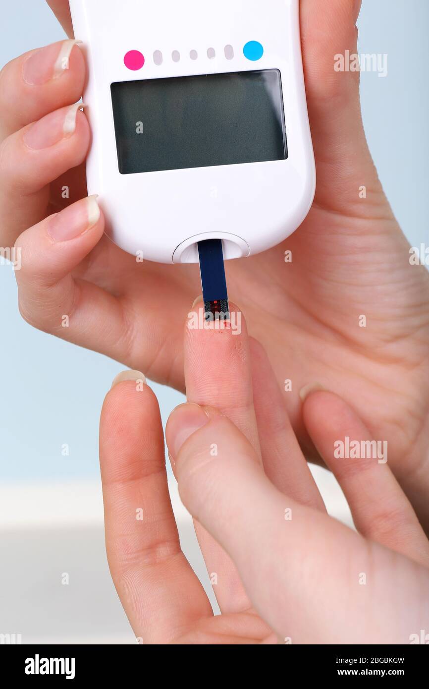 Measuring glucose level blood close-up Stock Photo - Alamy