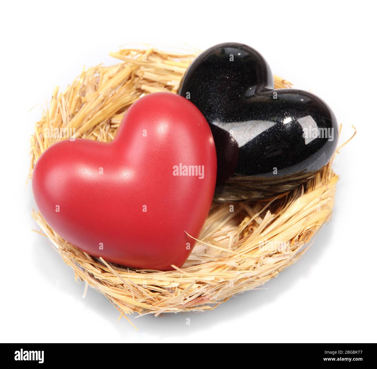 Decorative hearts in nest, isolated on white Stock Photo - Alamy