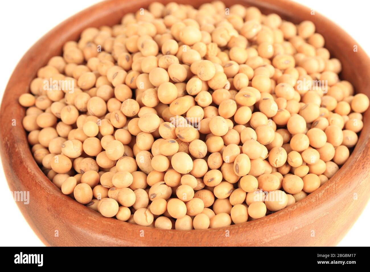 Raw soybeans in bowl isolated on white Stock Photo - Alamy