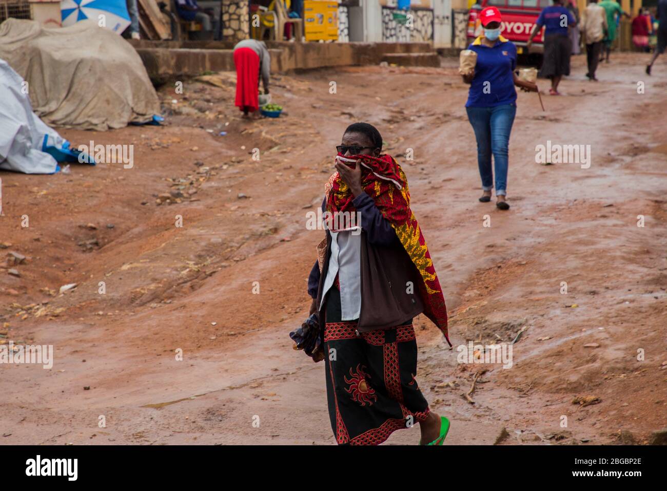 Kigali, Rwanda. 20th Apr, 2020. A local resident uses a cloth to cover ...