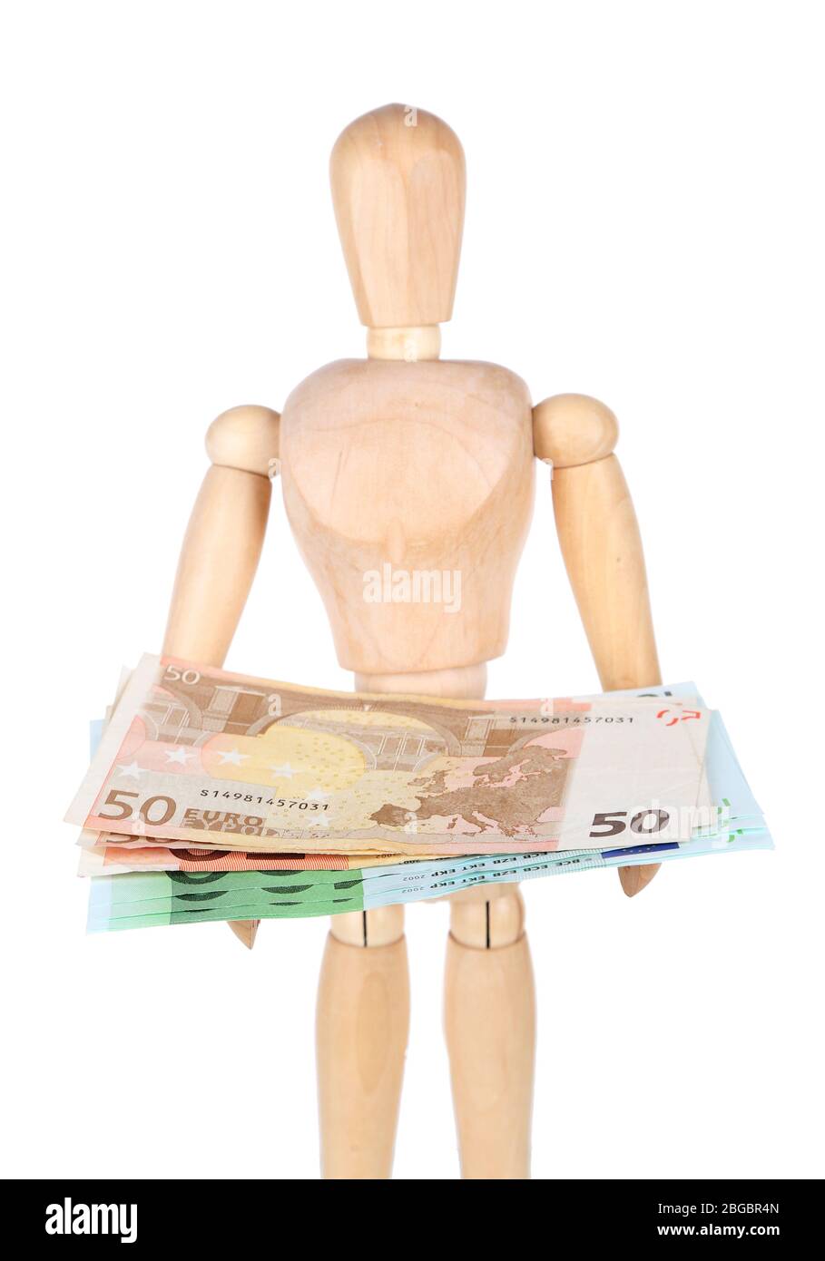 Wooden small mannequin with money isolated on white Stock Photo - Alamy