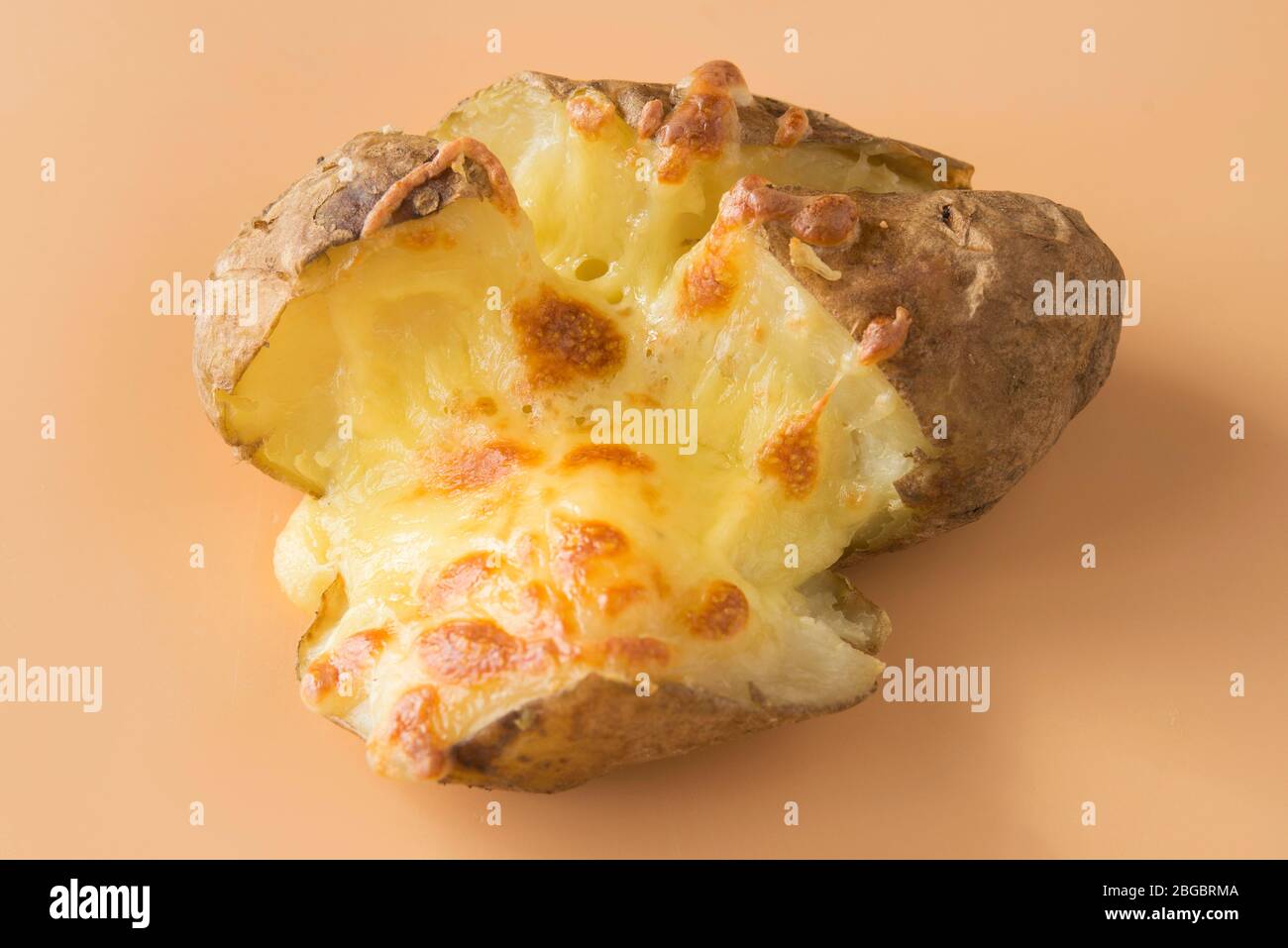 Jacket potatoes with cheddar cheese Stock Photo - Alamy