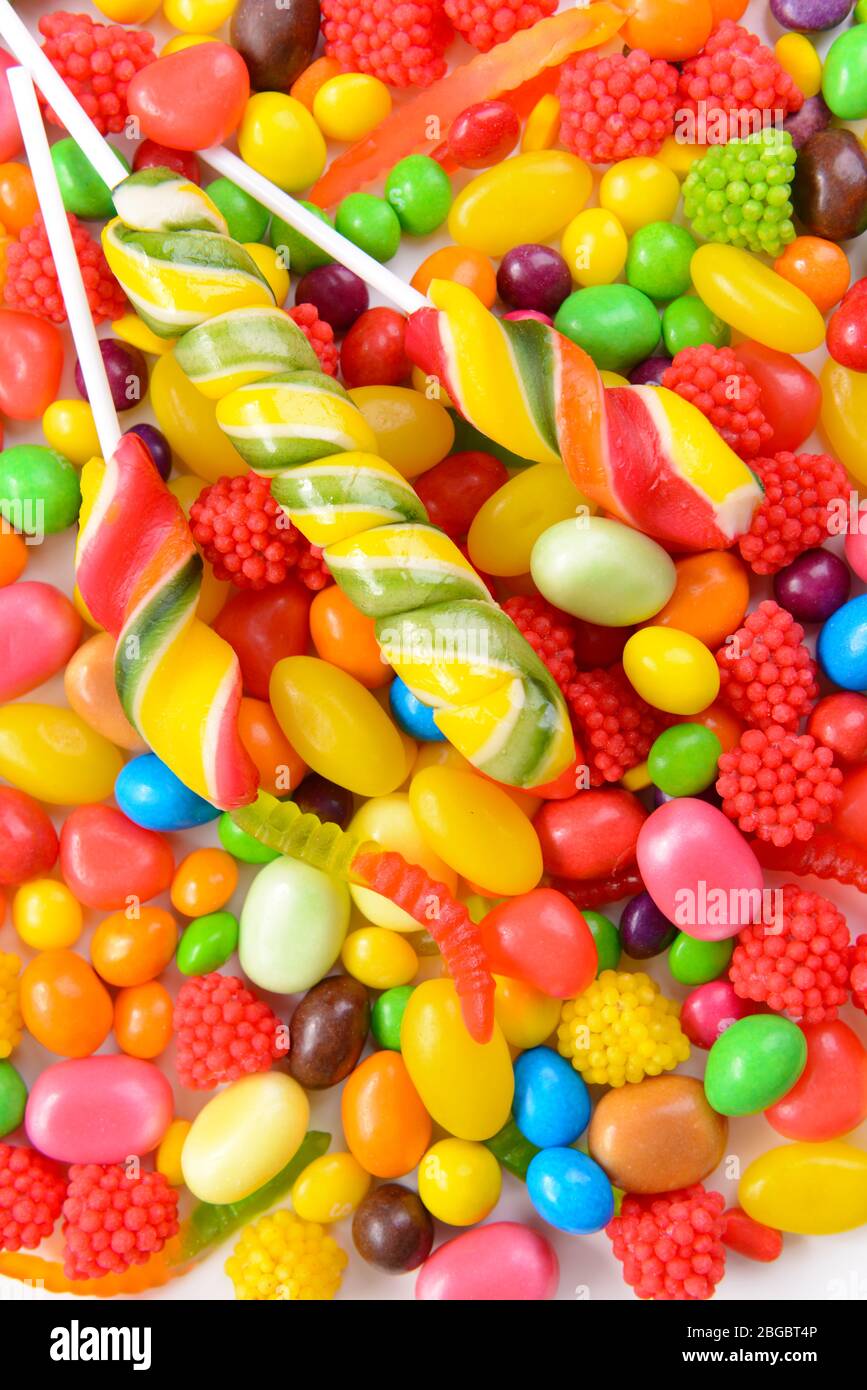 Different colorful fruit candy close-up Stock Photo - Alamy