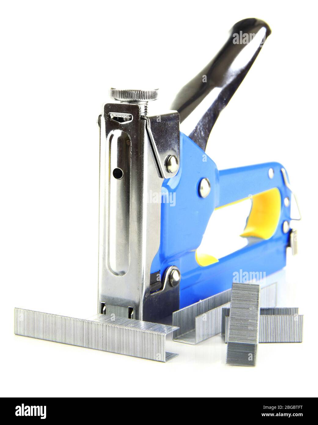 Construction stapler and staples isolated on white Stock Photo - Alamy