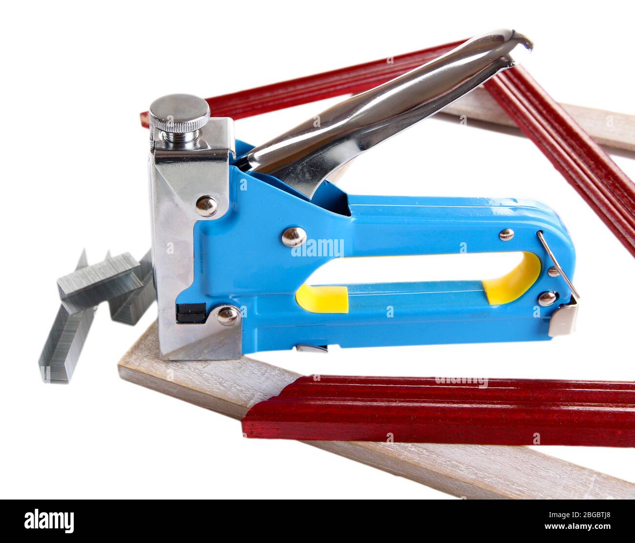 Construction stapler and wooden frames isolated on white Stock Photo ...