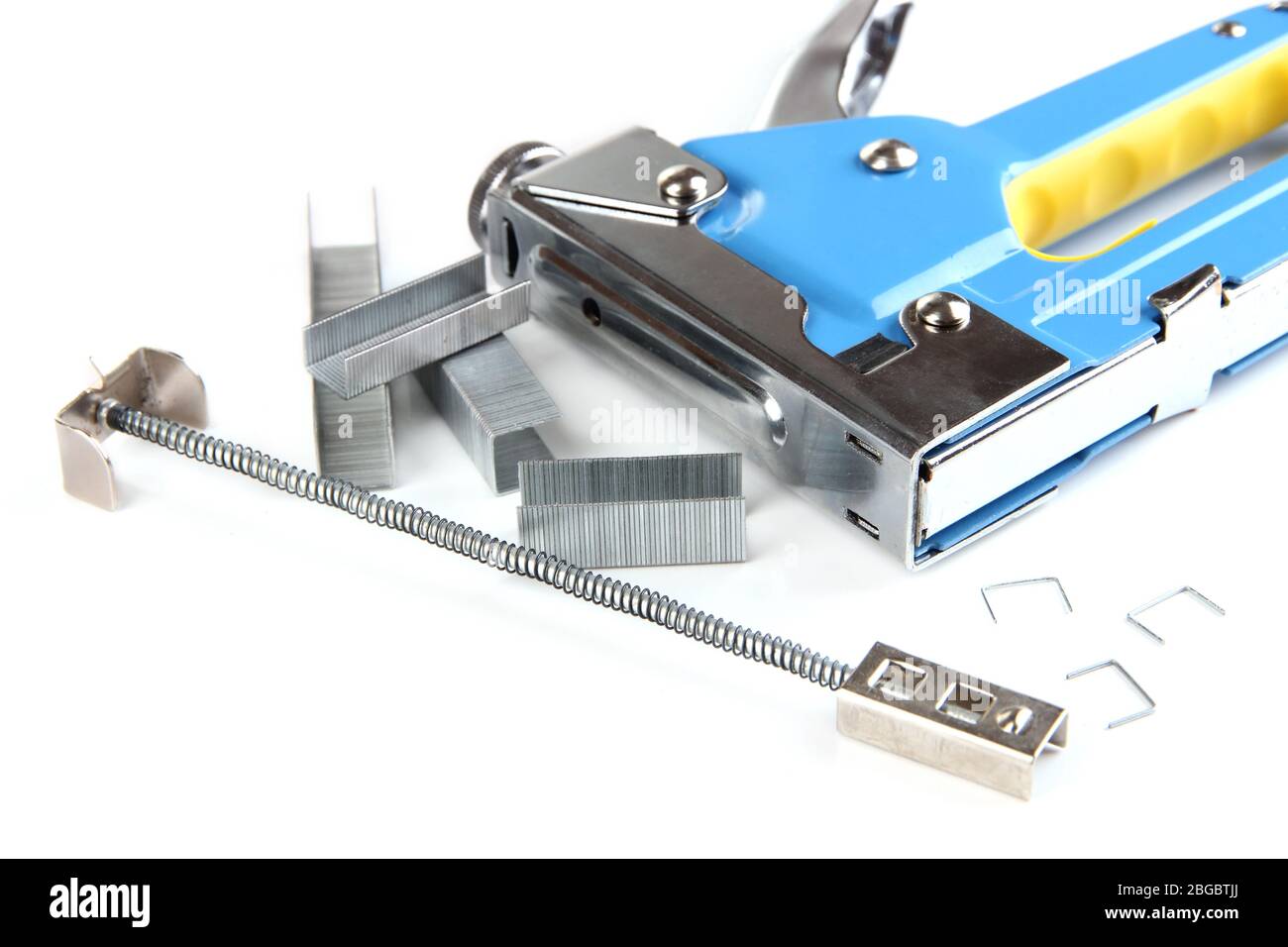 Construction stapler and staples isolated on white Stock Photo - Alamy
