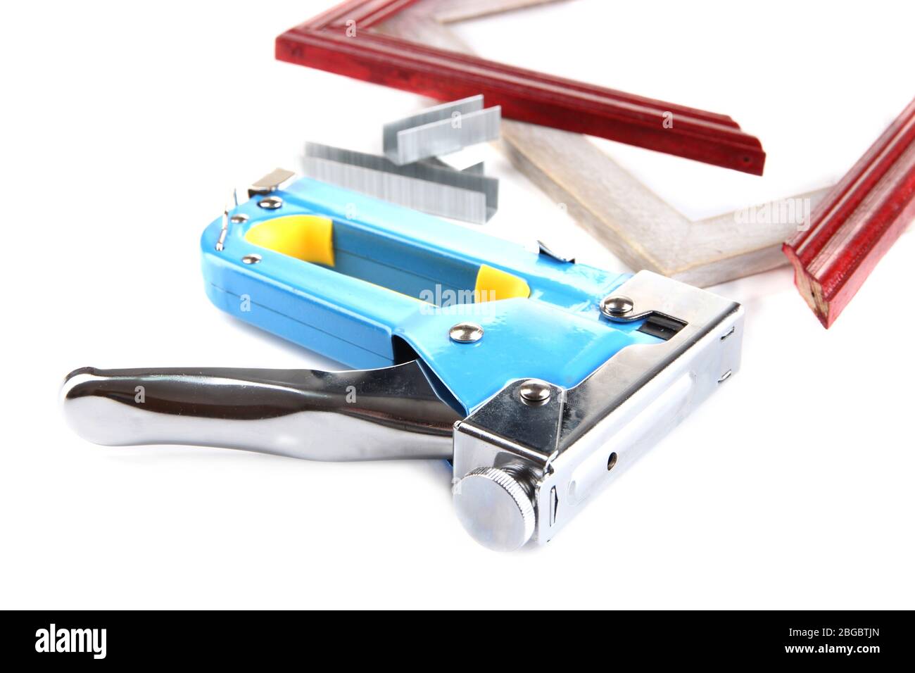 Construction stapler and wooden frames isolated on white Stock Photo ...