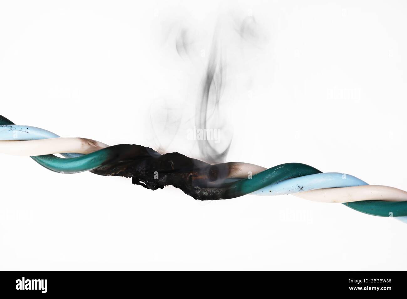 Short circuit, burnt cable, isolated on white Stock Photo - Alamy