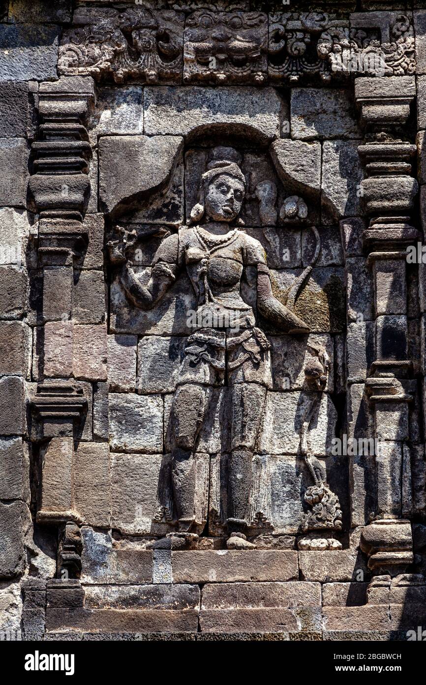 A Bas Relief Panel At Candi Lumbung Buddhist Temple, The Prambanan ...