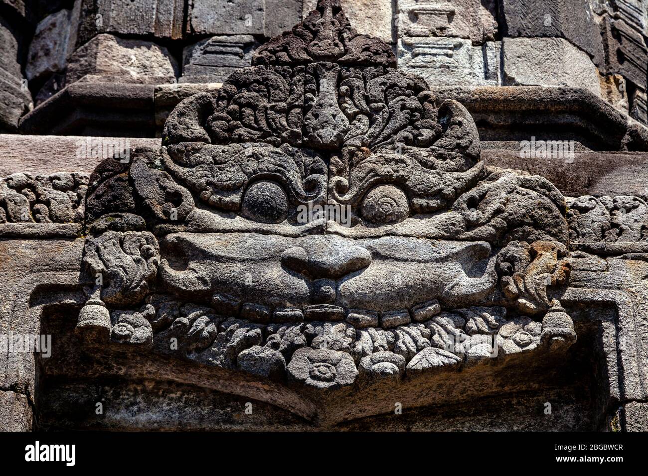 A Stone Carving Above A Doorway At Candi Lumbung Buddhist Temple, The ...
