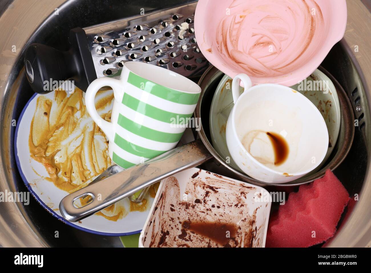 Kitchen utensils need wash close up Stock Photo - Alamy