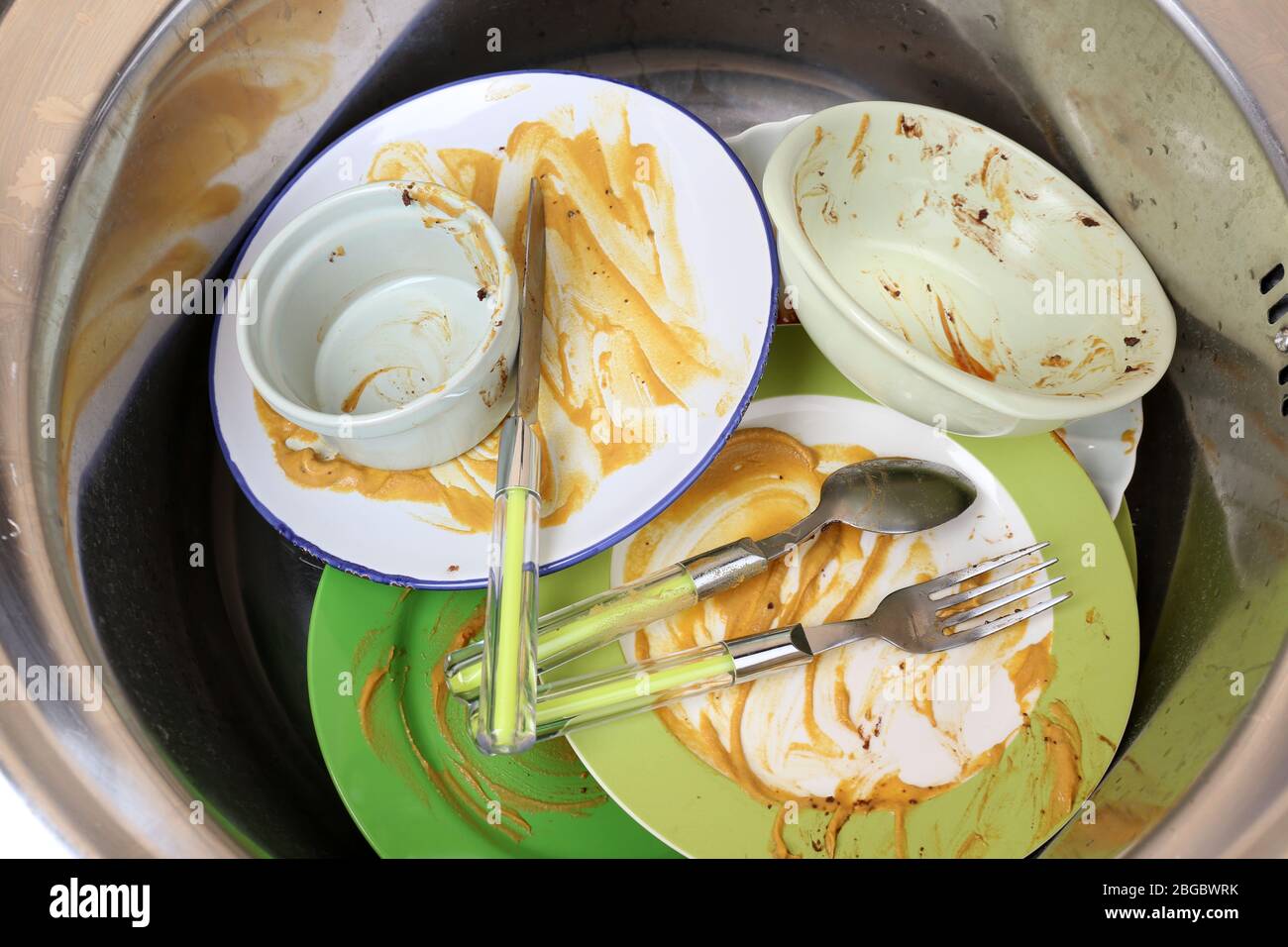 Kitchen utensils need wash close up Stock Photo - Alamy