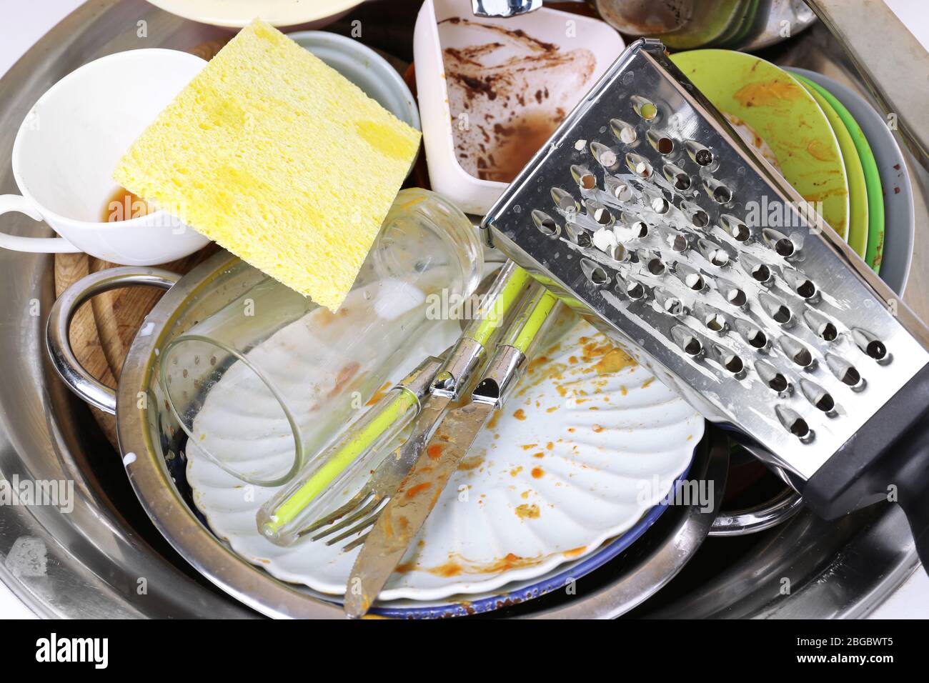 Kitchen utensils need wash close up Stock Photo - Alamy
