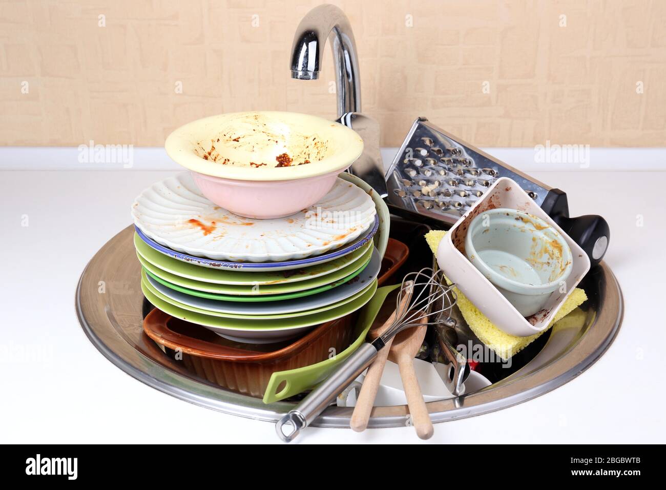 Kitchen utensils need wash close up Stock Photo - Alamy