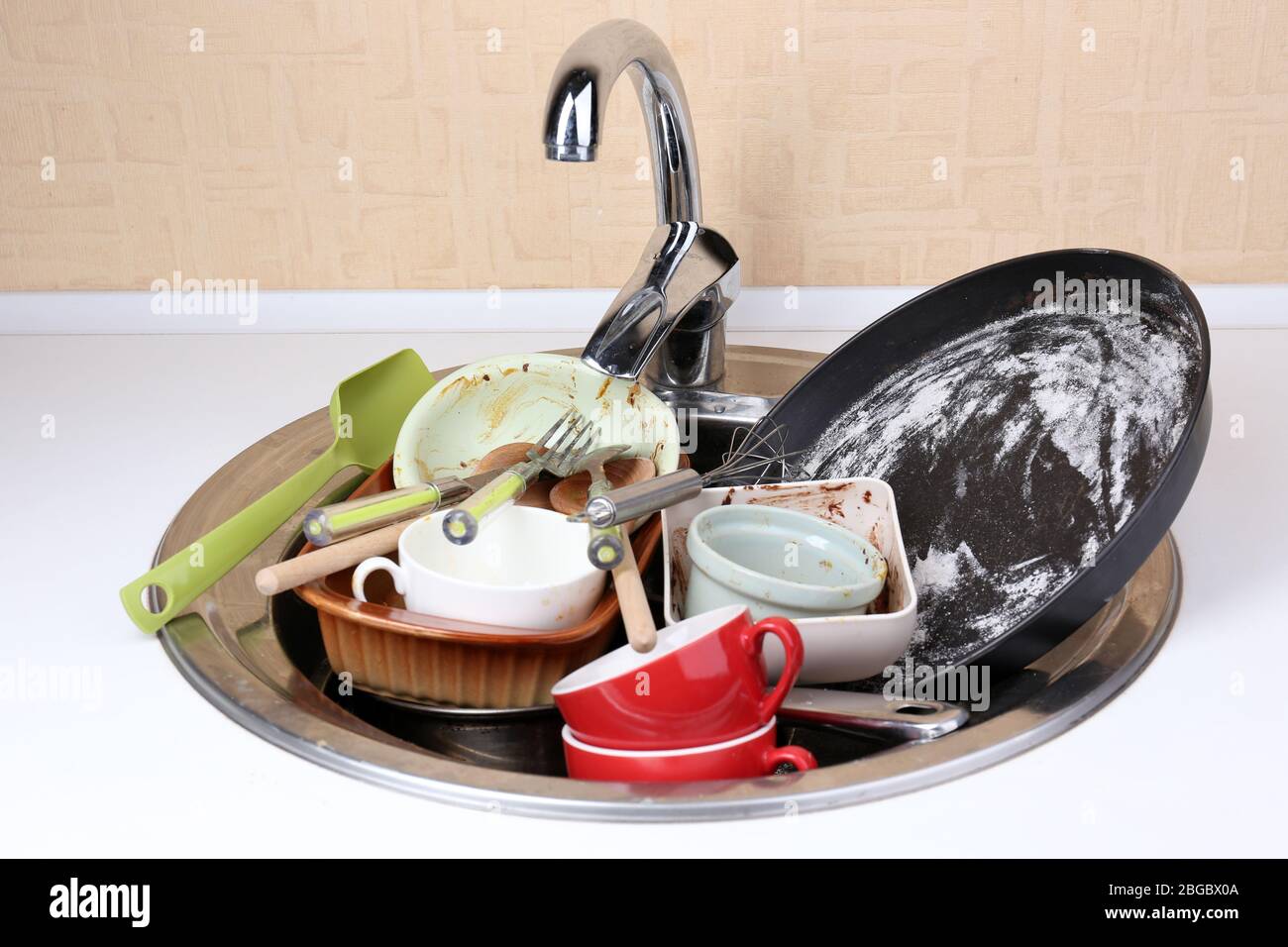 Kitchen utensils need wash close up Stock Photo - Alamy
