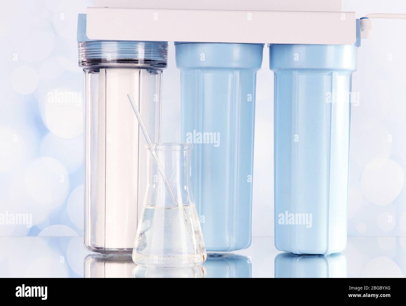 Filter system for water treatment on bright background Stock Photo - Alamy