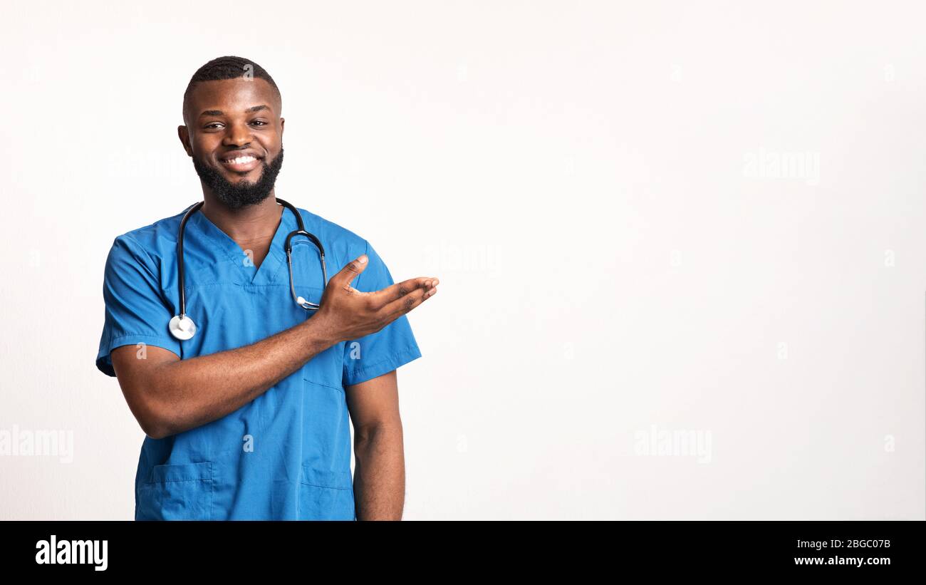 Smiling african american pointing hi-res stock photography and images ...